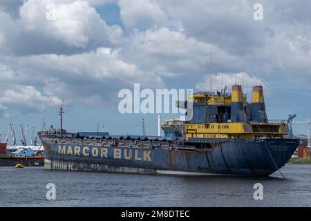 Port of Rotterdam scene with the permanently berthed storage vessel ...