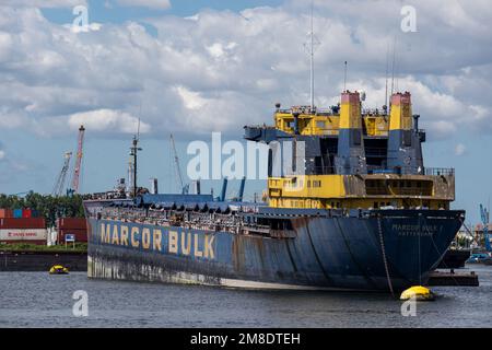 Port of Rotterdam scene with the permanently berthed storage vessel ...