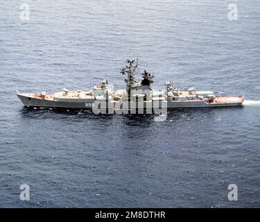 An aerial port beam view of the guided missile destroyer USS FARRAGUT ...