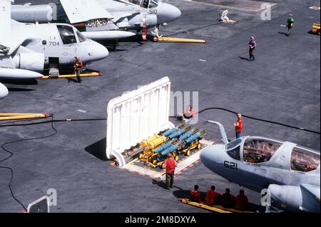 Aviation ordnancemen remove Aero 21A weapons skids loaded with AIM-9 ...