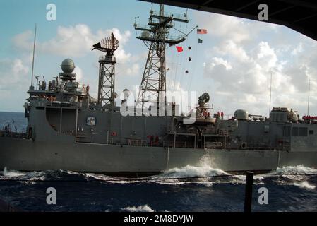 A view from the hangar of the frigate USS TRIPPE (FF-1075) of an SH-2 ...