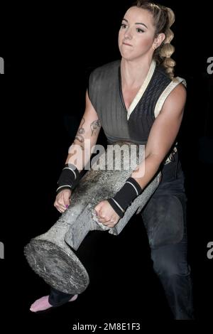 woman from the basque country practicing the rural sport of stone ...