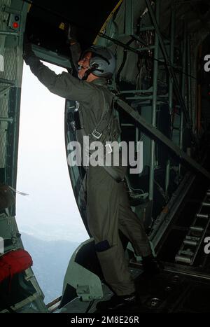 SRA Paul Stoner, the loadmaster aboard a 345th Tactical Airlift ...