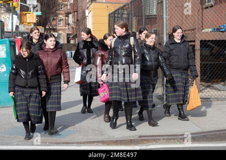 Orthodox Jewish schoolgirls wearing the same uniforms walking on ...