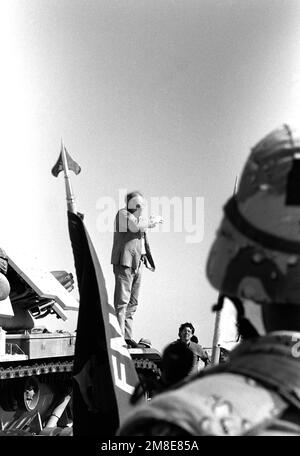 Secretary of Defense Richard Cheney addresses a group of Marines while ...