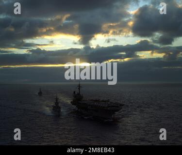 The frigate USS COOK (FF-1083) is moored alongside the fast combat ...