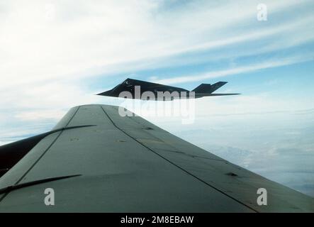 A 37th Tactical Fighter Wing (37th TFW) F-117A aircraft sits inside a ...