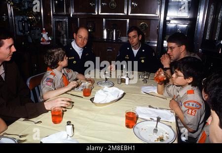 Members of Boy Scout Troop 85 assemble with crew members on the deck of ...