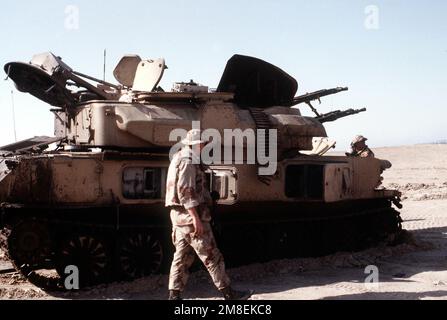 An Iraqi ZSU-23-4 self-propelled 23mm anti-aircraft gun system sits on ...