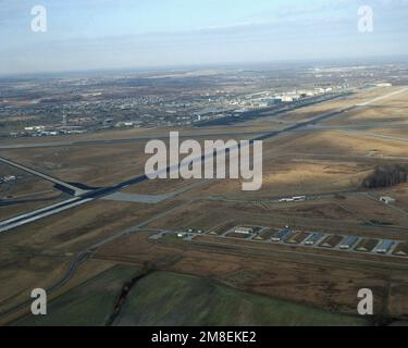An aerial view of a portion of the runway and facilities on the base ...