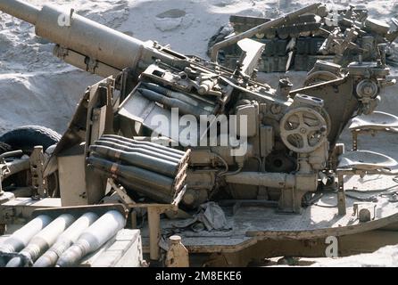 An Iraqi S-60 57mm automatic anti-aircraft gun sits in its emplacement ...