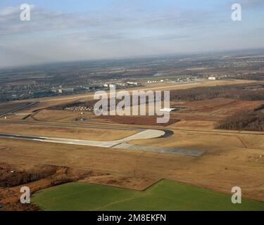 An aerial view of a portion of the base, showing the main runway and ...
