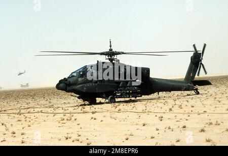An AH-64A Apache anti-tank helicopter of the XVIII Airborne Corps ...