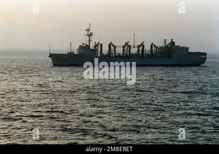 The replenishment oiler USS KALAMAZOO (AOR-6) lies at anchor as it ...
