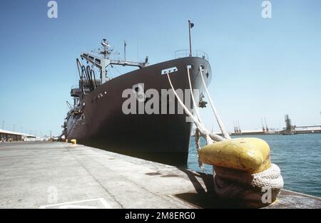 The Military Sealift Command combat stores ship USNS SIRIUS (T-AFS-8) tied up to take on cargo ...