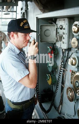 The ocean minesweeper USS IMPERVIOUS (MSO-449) and other vessels are ...