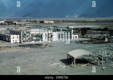A destroyed hangar at Kuwait International Airport after the retreat of ...