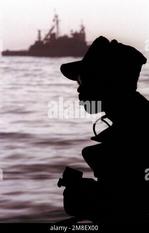 The salvage and rescue ship USS EDENTON (ATS-1) tows the decommissioned ...
