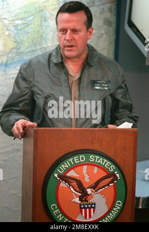 Rear Adm. Raynor A.K. Taylor, commander, Middle East Forces, shakes ...