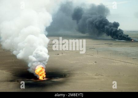 Oil well fires rage outside Kuwait City in the aftermath of the First ...