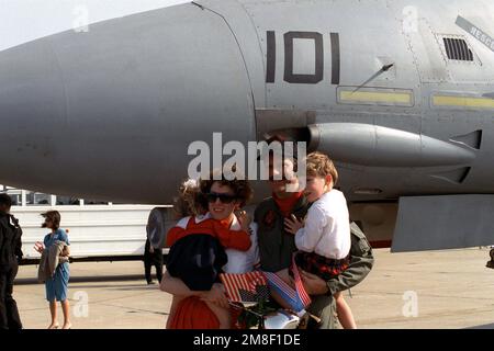 The pilot of a Fighter Squadron 74 (VF-74) F-14B Tomcat aircraft waits for instructions on the ...