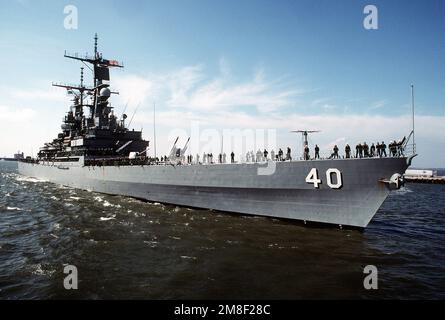 With its crew manning the rails, the nuclear-powered guided missile ...