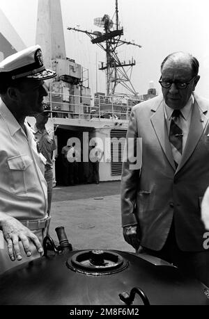 Rear Adm. Raynor A.K. Taylor, commander, Middle East Forces, shakes ...