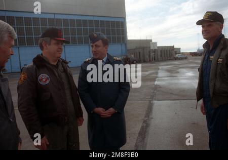 Undersecretary of the Navy Daniel Howard, right, moves away from a ...