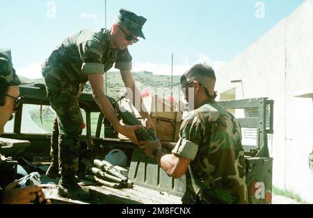 Marines load M998 High-Mobility Multipurpose Wheeled Vehicles (HMMWV ...