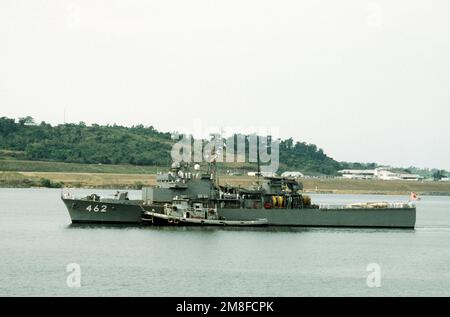The large harbor tug OPELIKA (YTB-798) pulls up along the starboard ...