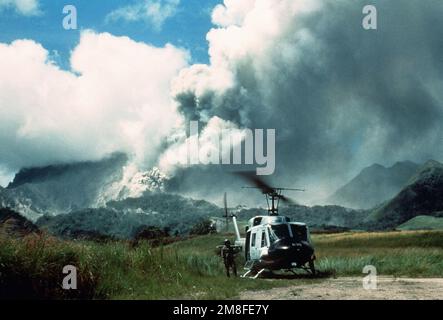 Clouds of ash pour from Mount Pinatubo as the volcano comes alive for ...