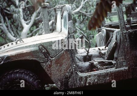 Ash covers a vehicle following the eruption of Mount Pinatubo, a ...