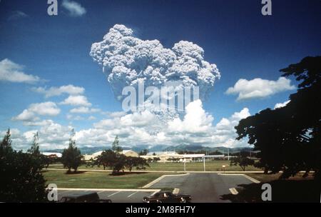 Clouds of ash pour from Mount Pinatubo as the volcano erupts for the ...