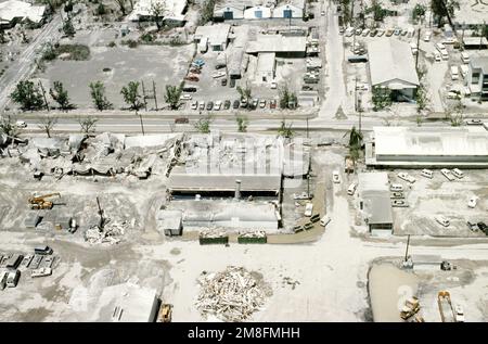 Buildings collapse under the weight of volcanic ash and typhoon rains ...