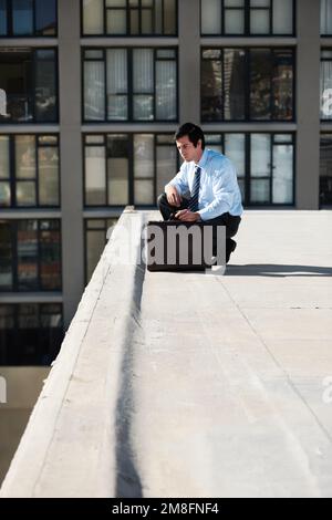 Bankrupt businessman thinking of suicide Stock Photo - Alamy