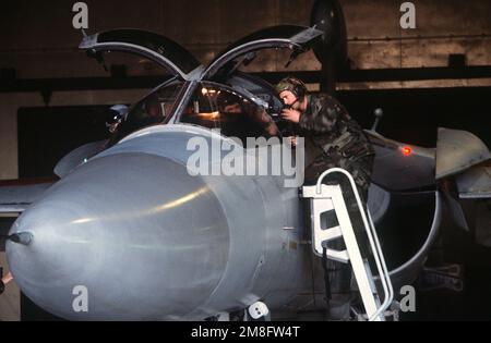 The crew chief of a 42nd Electronic Combat Squadron EF-111A Raven ...