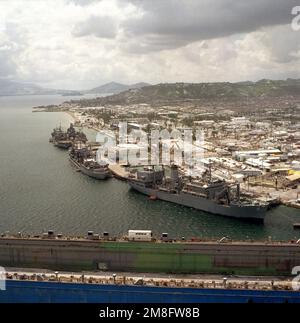 A view of a portion of the naval station. The buildings at center are ...