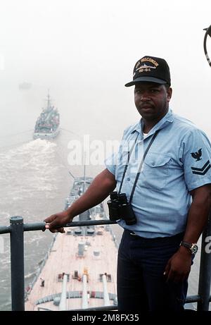 The salvage and rescue ship USS EDENTON (ATS-1) tows the decommissioned ...