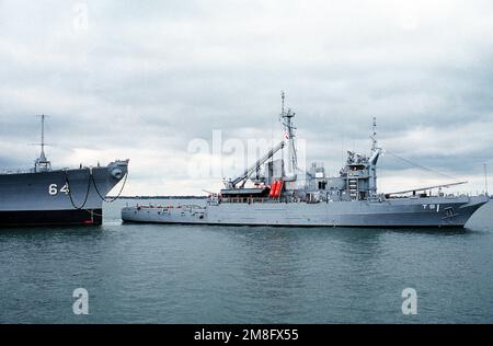 The salvage and rescue ship USS EDENTON (ATS-1) tows the decommissioned ...