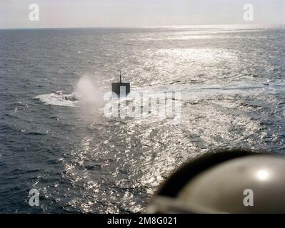 A port beam view of the nuclear-powered guided missile cruiser USS ...