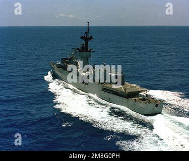 A port quarter view of the frigate USS MOINESTER (FF-1097) underway ...