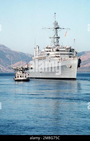 The large harbor tug WAUWATOSA (YTB-775) moves the amphibious assault ...