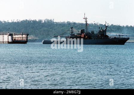 The small auxiliary floating dry dock ADEPT (AFDL-23) leaves Subic Bay ...