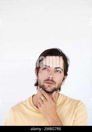 Thinking, face and mockup man focus on development ideas, planning or ...