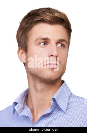 Hes got the look. Shot of a handsome young businessman standing against ...