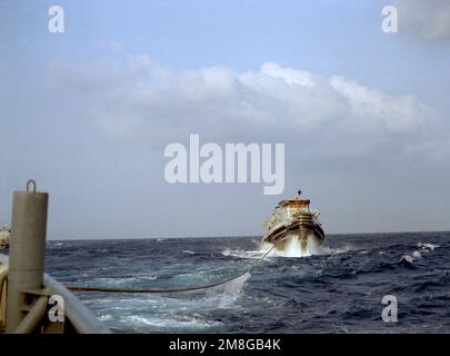 The large harbor tug EUFAULA (YTB-800) is towed by the salvage ship USS ...