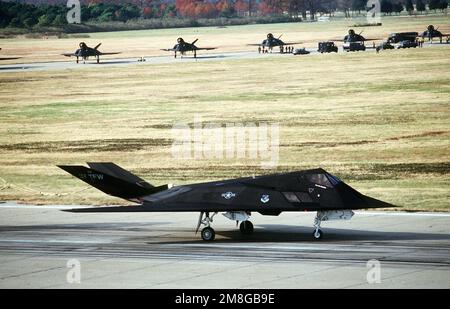 A 37th Tactical Fighter Wing (37th TFW) F-117A aircraft sits inside a ...