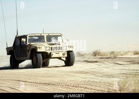 An M1038 High-Mobility Multipurpose Wheeled Vehicle (HMMWV) and a ...