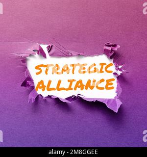 Hand writing sign Strategic Alliance. Business overview a bond between ...
