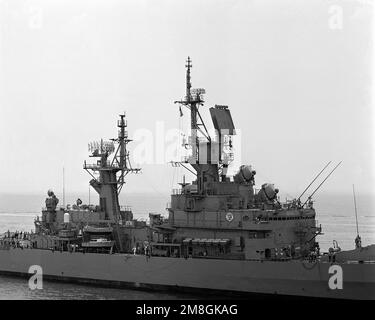 The guided missile cruiser USS JOSEPHUS DANIELS (CG 27) maneuvers ...
